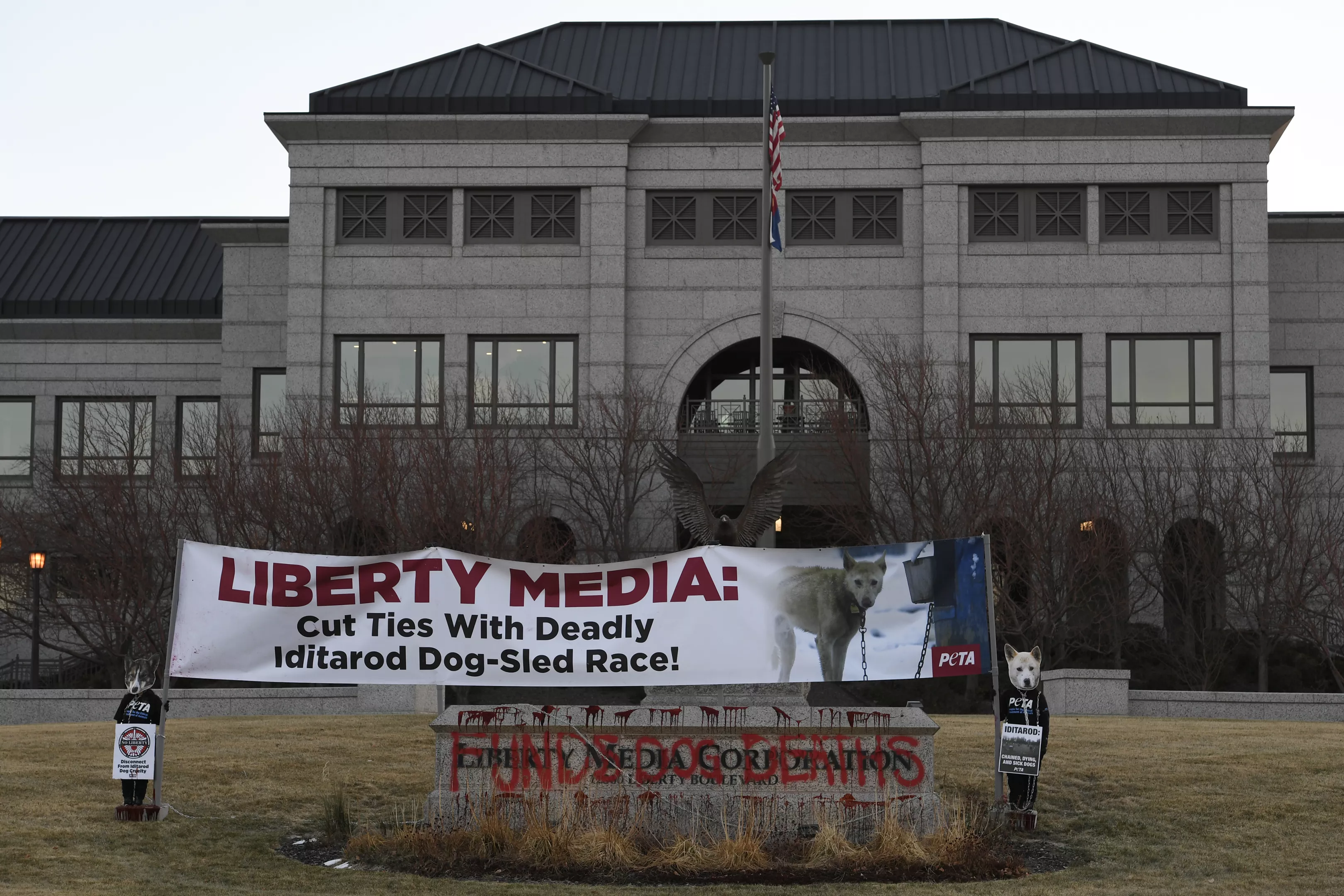 Colorado PETA Members Chain and Seal Themselves in Cement for Protest ...