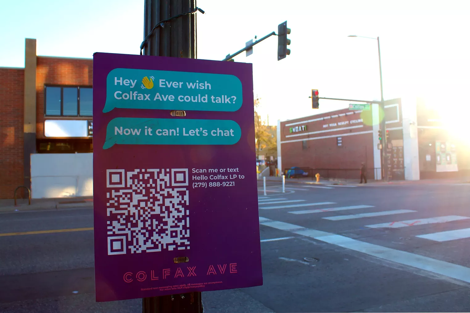 Colfax Avenue Learns to Talk Through New Hello Lamp Post Signs | Westword